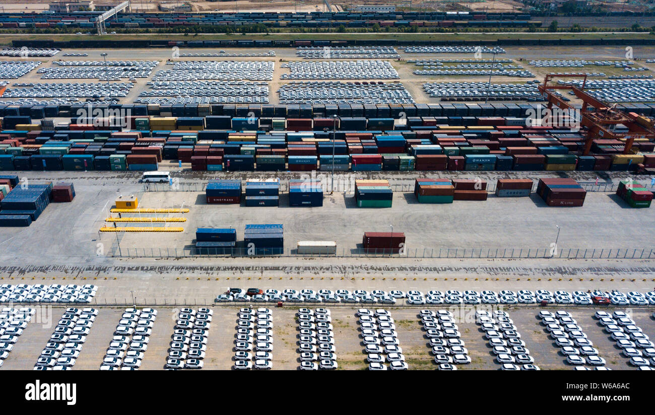 Cargo containers and cars shipped by The Volvo finished vehicle import ...