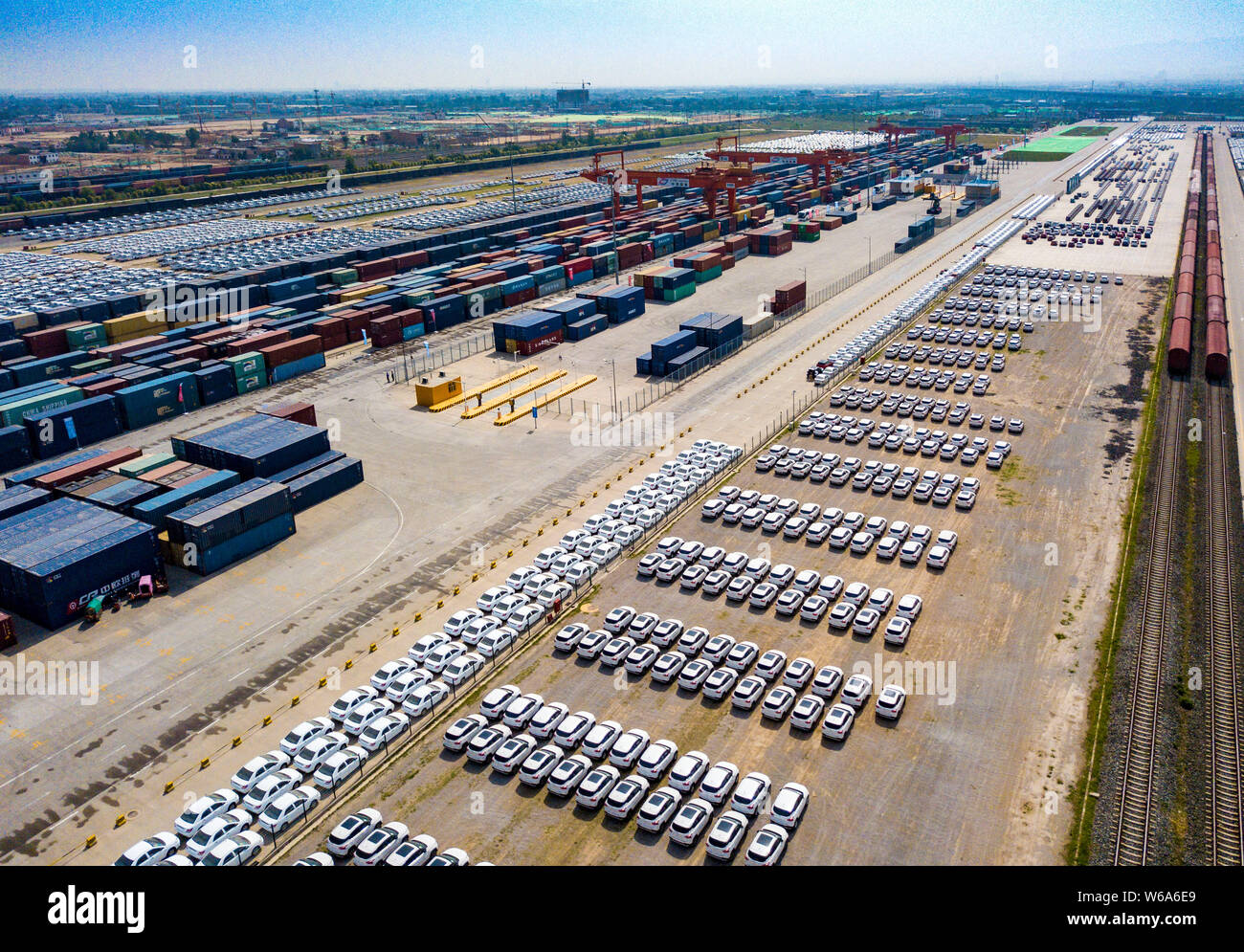 Cargo containers and cars shipped by The Volvo finished vehicle import ...