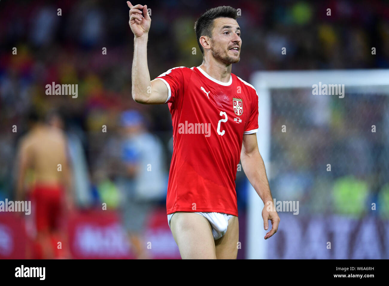 Antonio Rukavina of Serbia who lost his shorts reacts after their Group ...