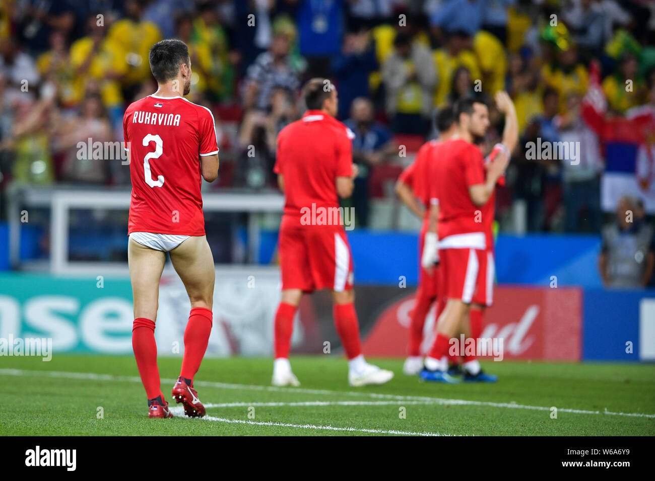 Antonio Rukavina of Serbia who lost his shorts walks towards the ...