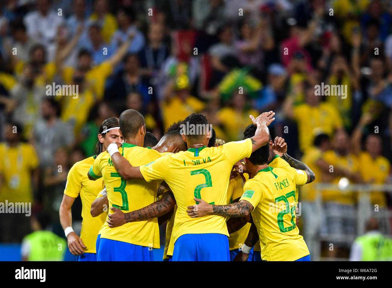 Players of Brazil celebrate after Paulinho scored a goal against Serbia ...