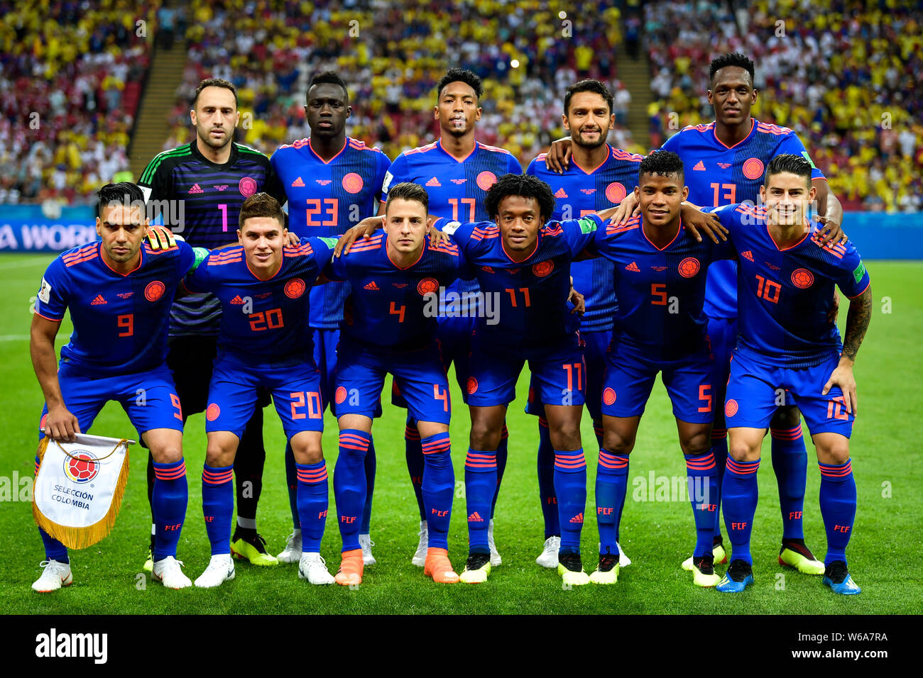 Players of the starting line-up of Colombia pose for photos before ...