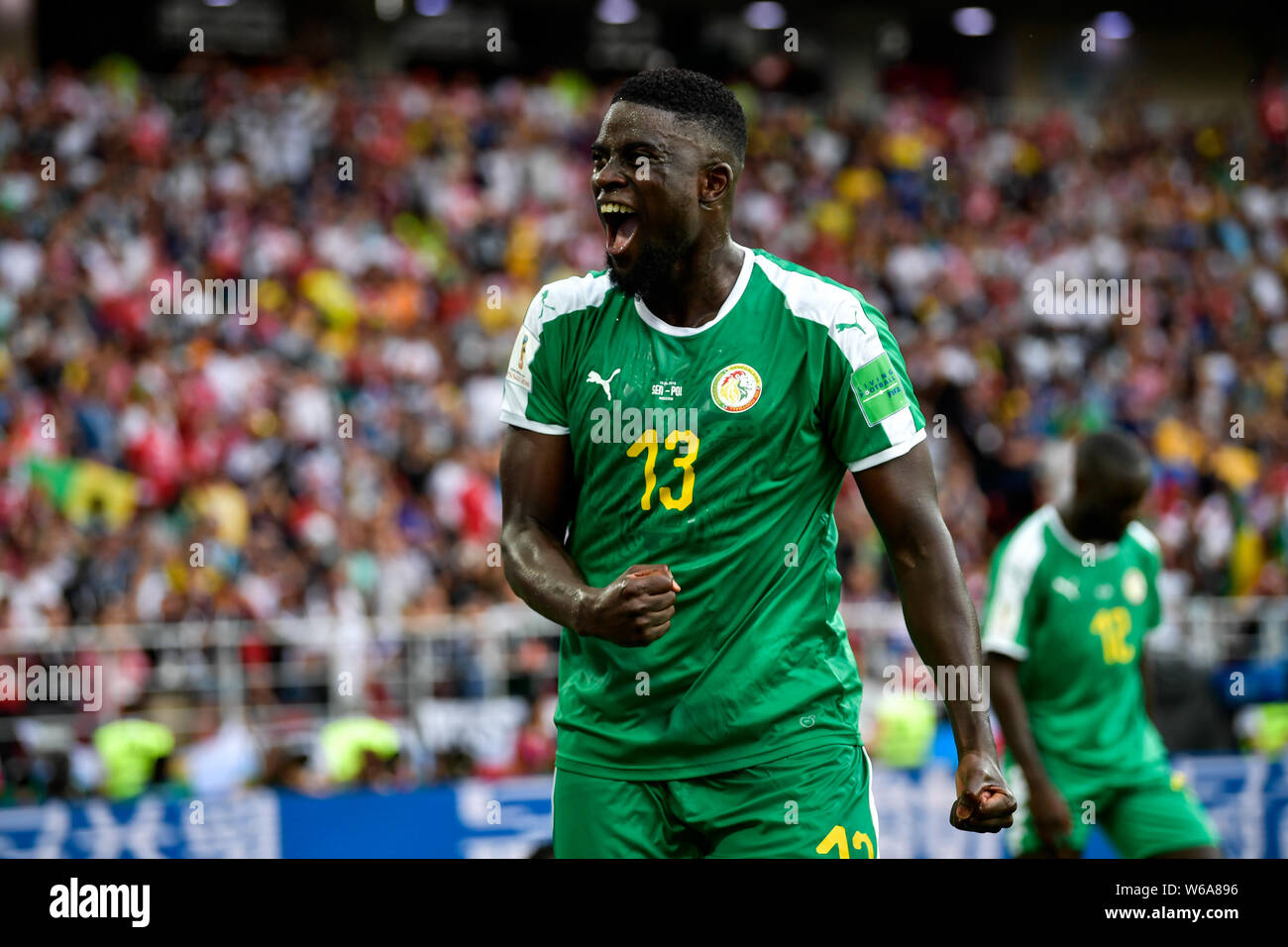Alfred N'Diaye of Senegal reacts after M'Baye Niang scored a goal ...