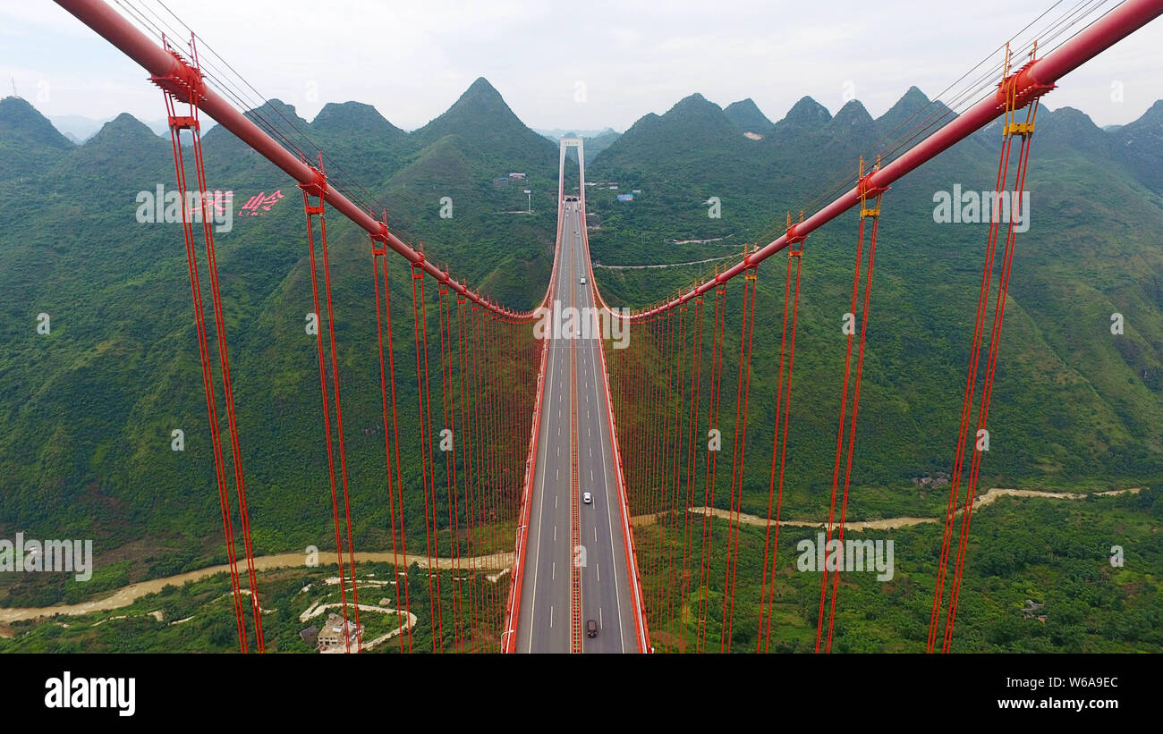Aerial view of the Baling River Bridge 370 meters high over a valley in ...