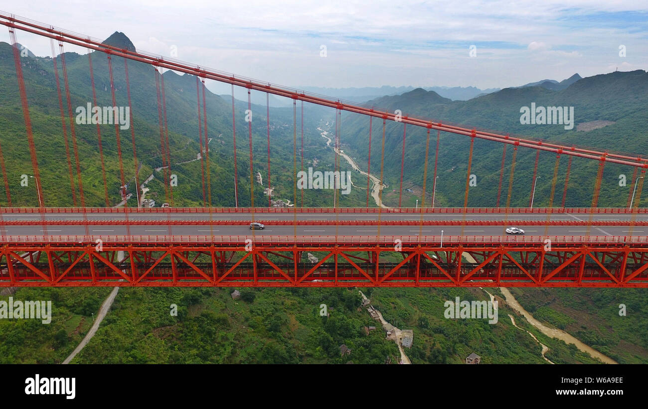 Aerial view of the Baling River Bridge 370 meters high over a valley in ...