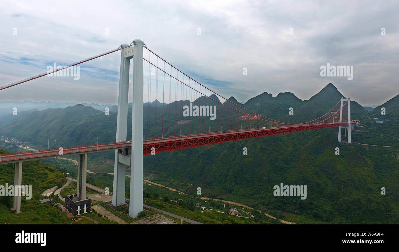 Aerial view of the Baling River Bridge 370 meters high over a valley in ...