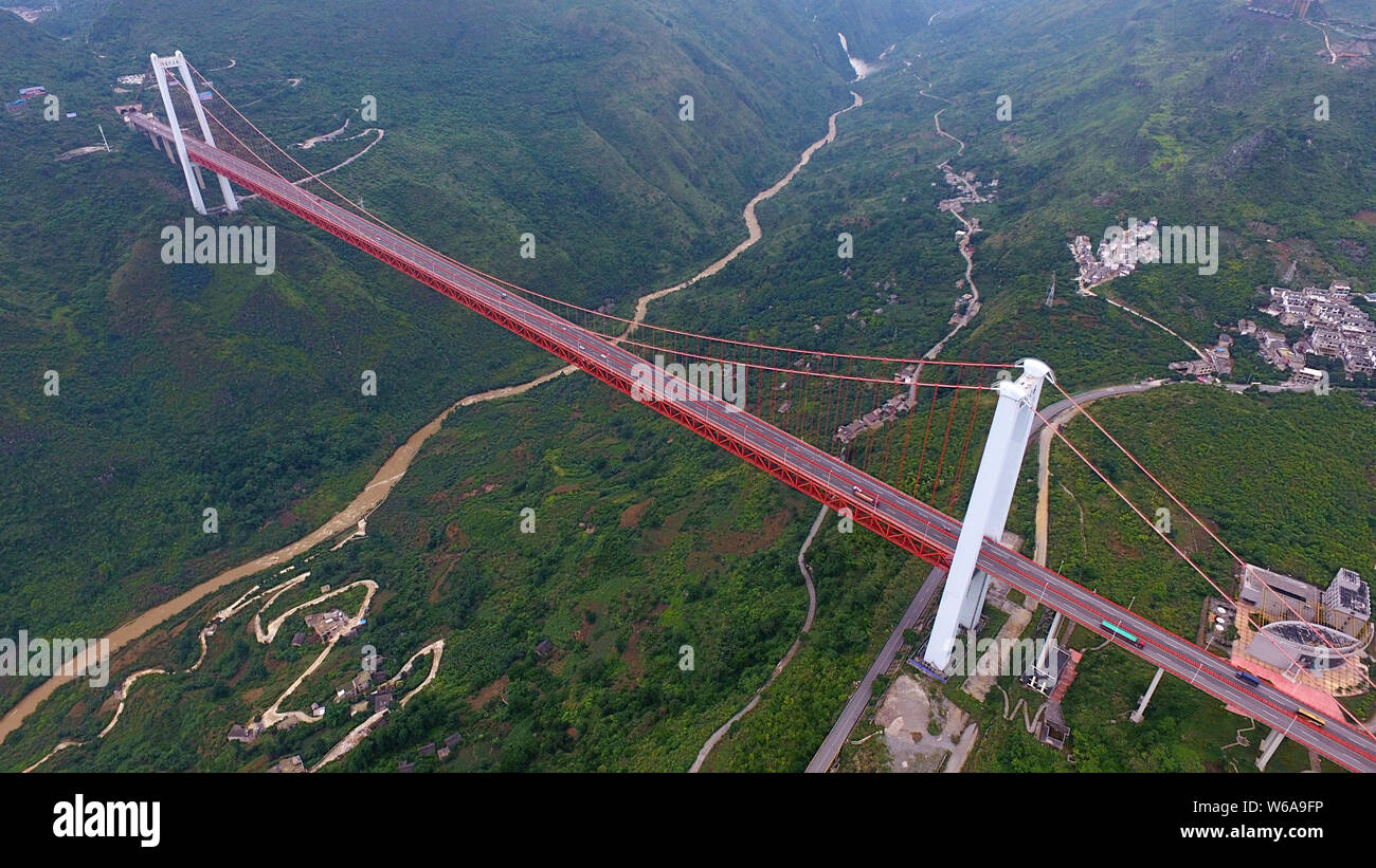 Aerial view of the Baling River Bridge 370 meters high over a valley in ...