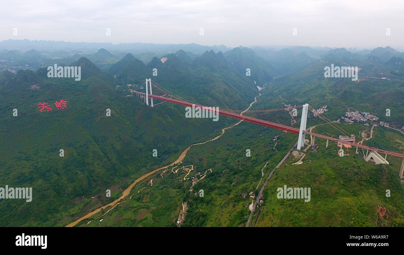 Aerial view of the Baling River Bridge 370 meters high over a valley in ...