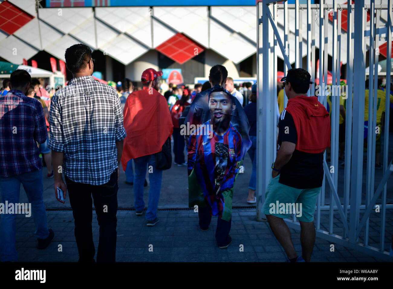 Serbian fans are dressed up as they gather outside the Spartak Stadium ...