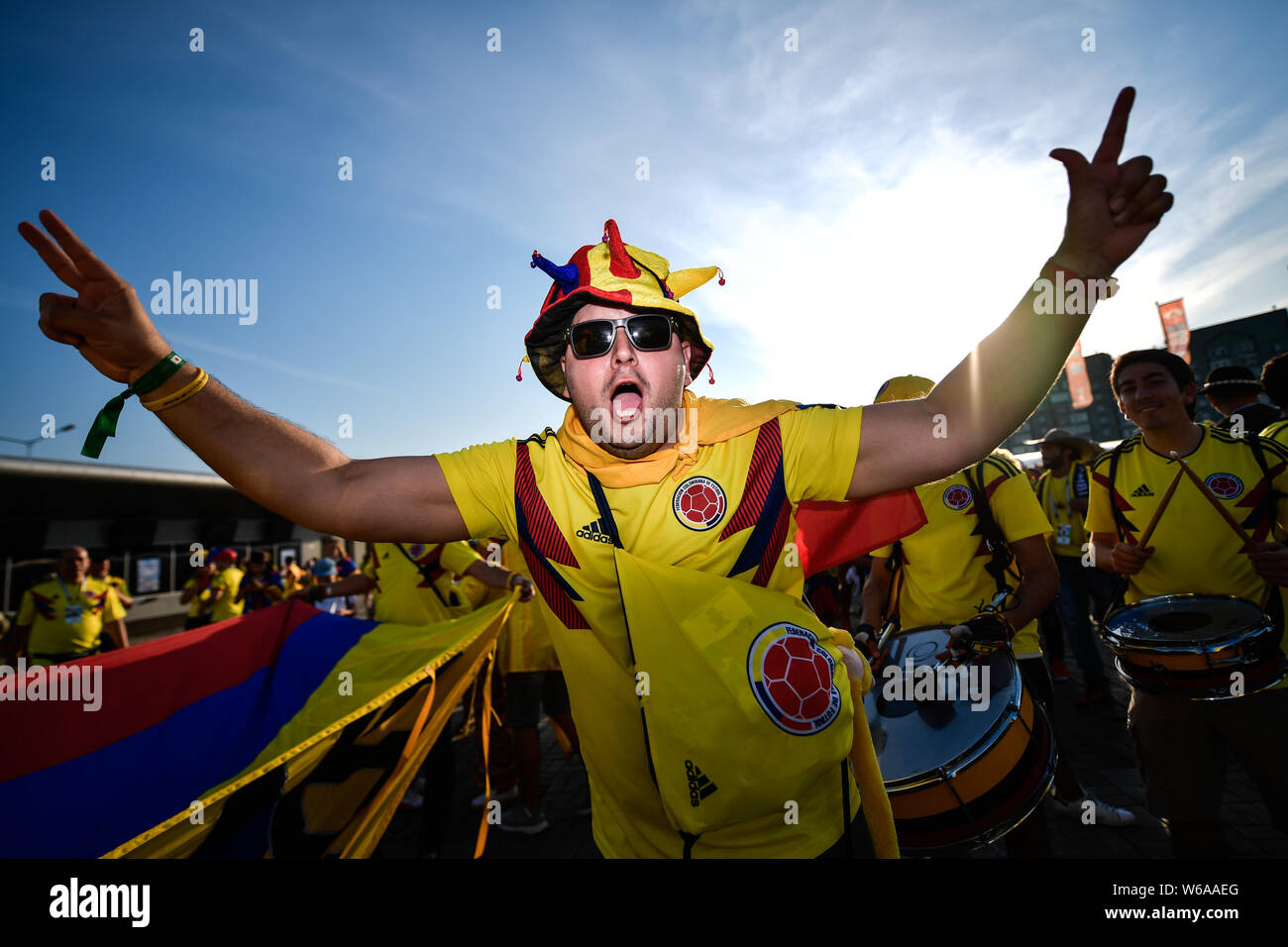 Colombian fans are dressed up as they gather outside the Kazan Arena ...