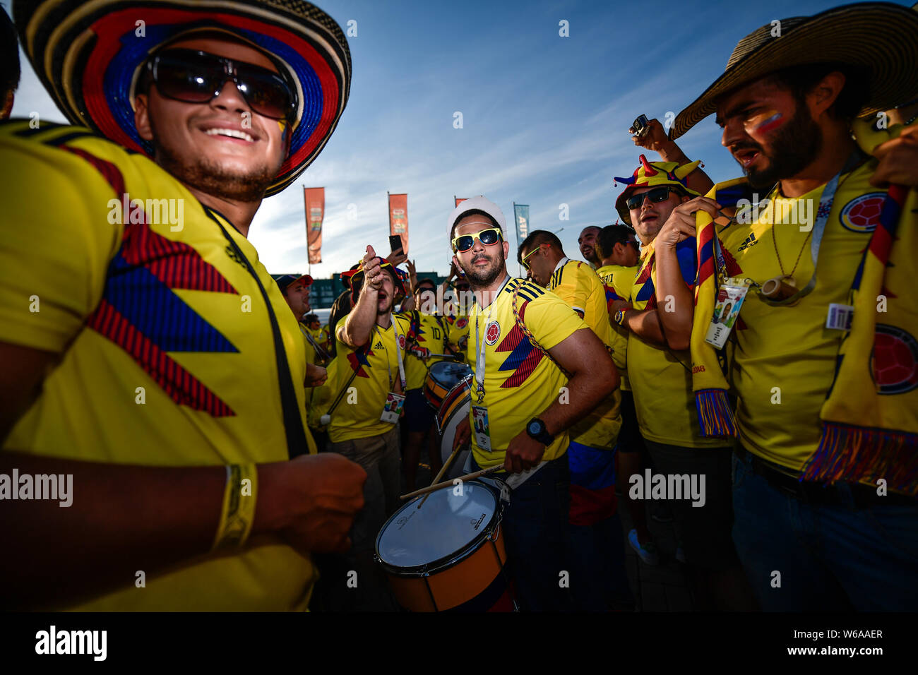 Colombian fans are dressed up as they gather outside the Kazan Arena ...