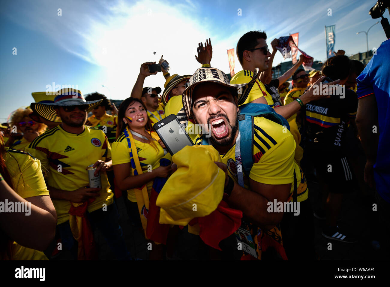 Colombian fans are dressed up as they gather outside the Kazan Arena ...