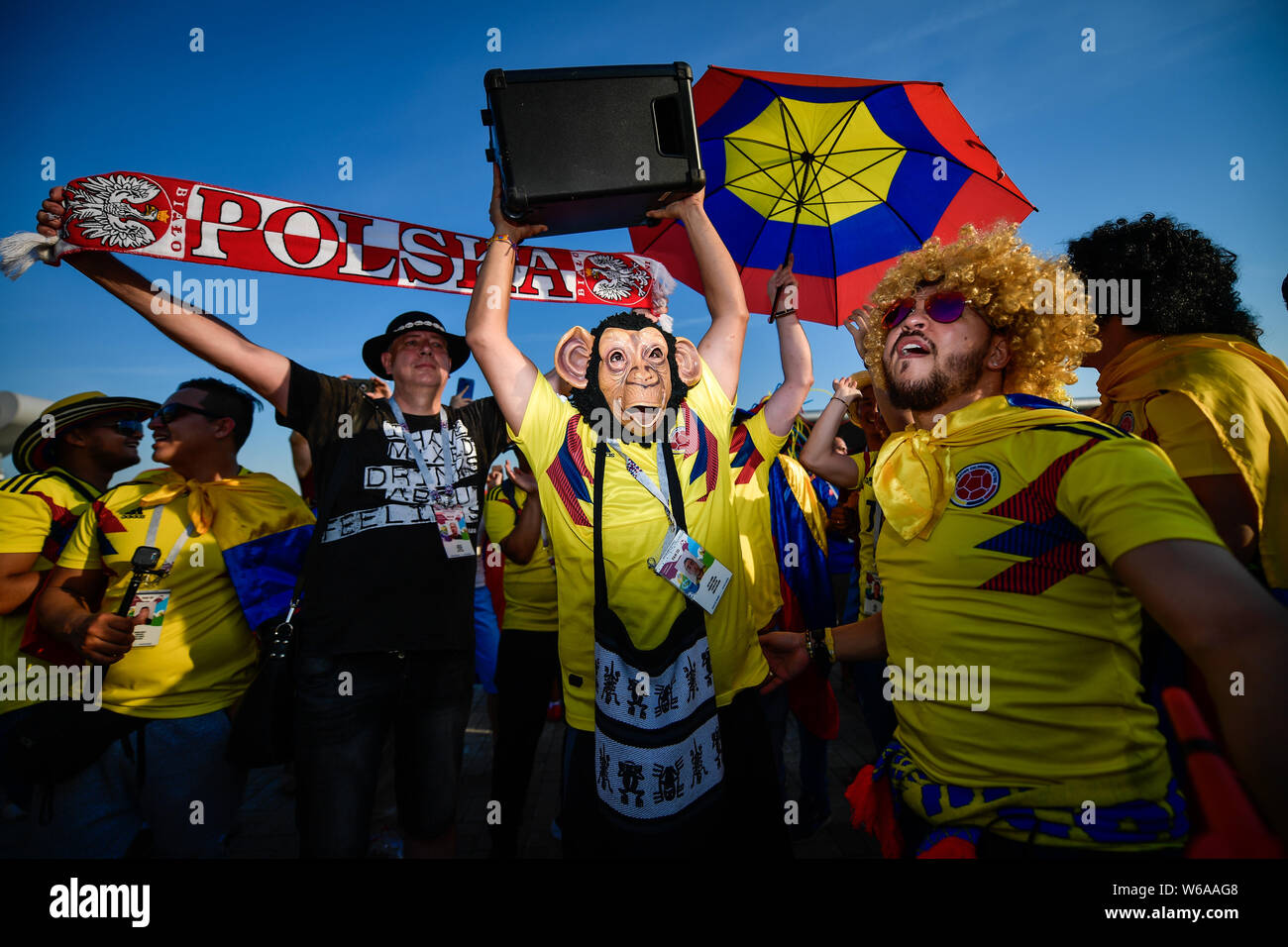 Colombian fans are dressed up as they gather outside the Kazan Arena ...