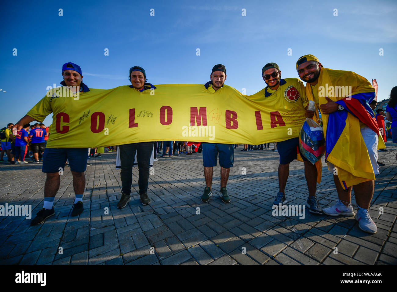 Colombian fans are dressed up as they gather outside the Kazan Arena ...