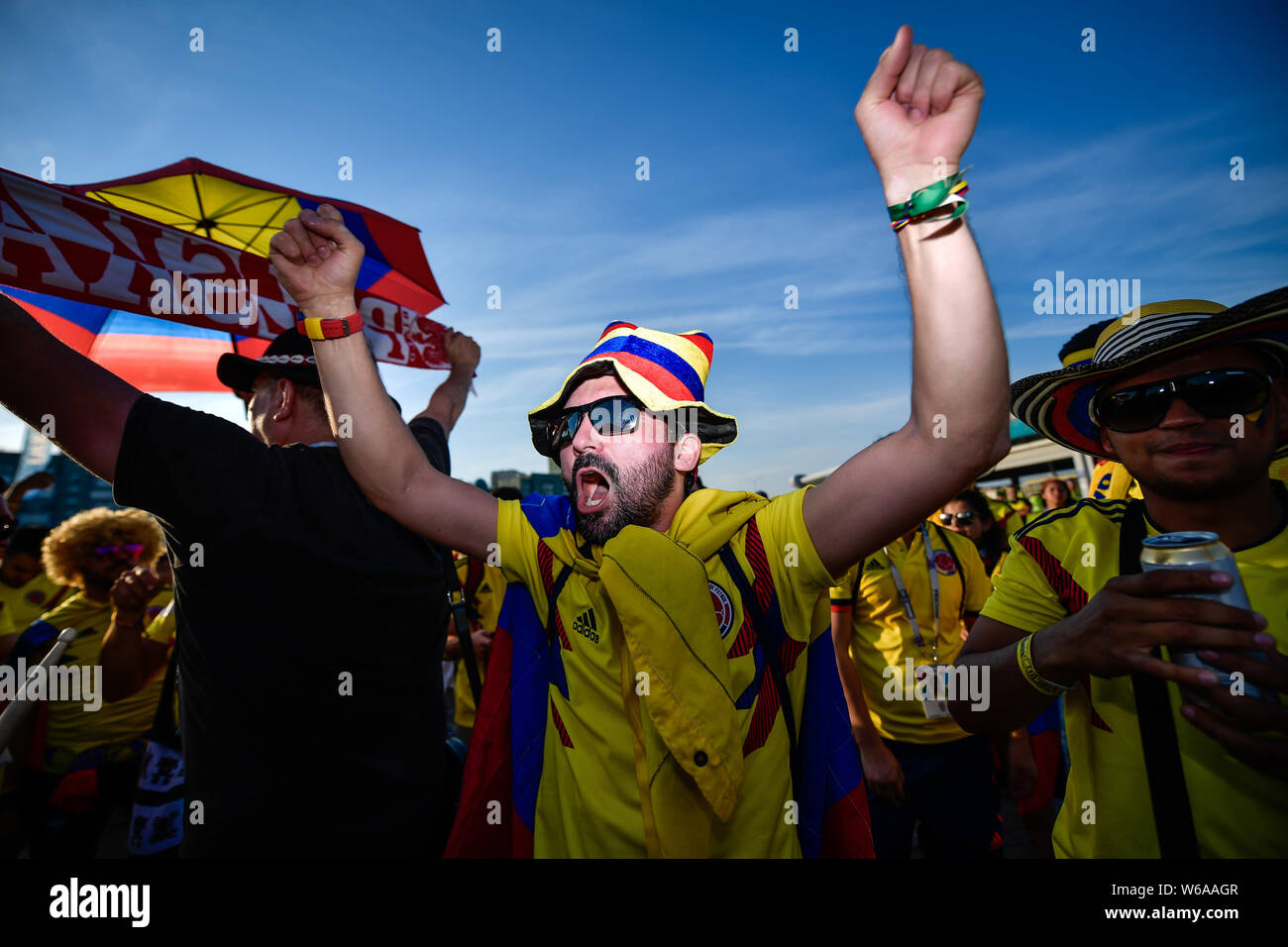 Colombian fans are dressed up as they gather outside the Kazan Arena ...