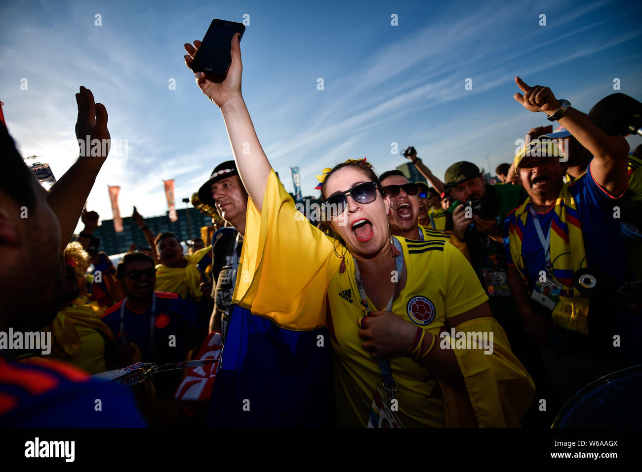 Colombian fans are dressed up as they gather outside the Kazan Arena ...
