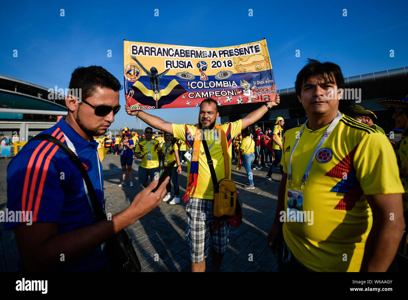 Colombian fans are dressed up as they gather outside the Kazan Arena ...