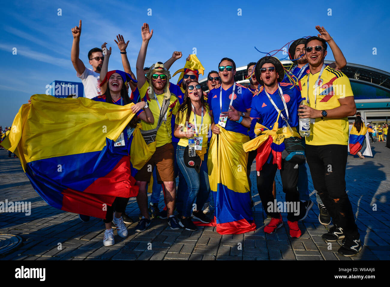 Colombian fans are dressed up as they gather outside the Kazan Arena ...