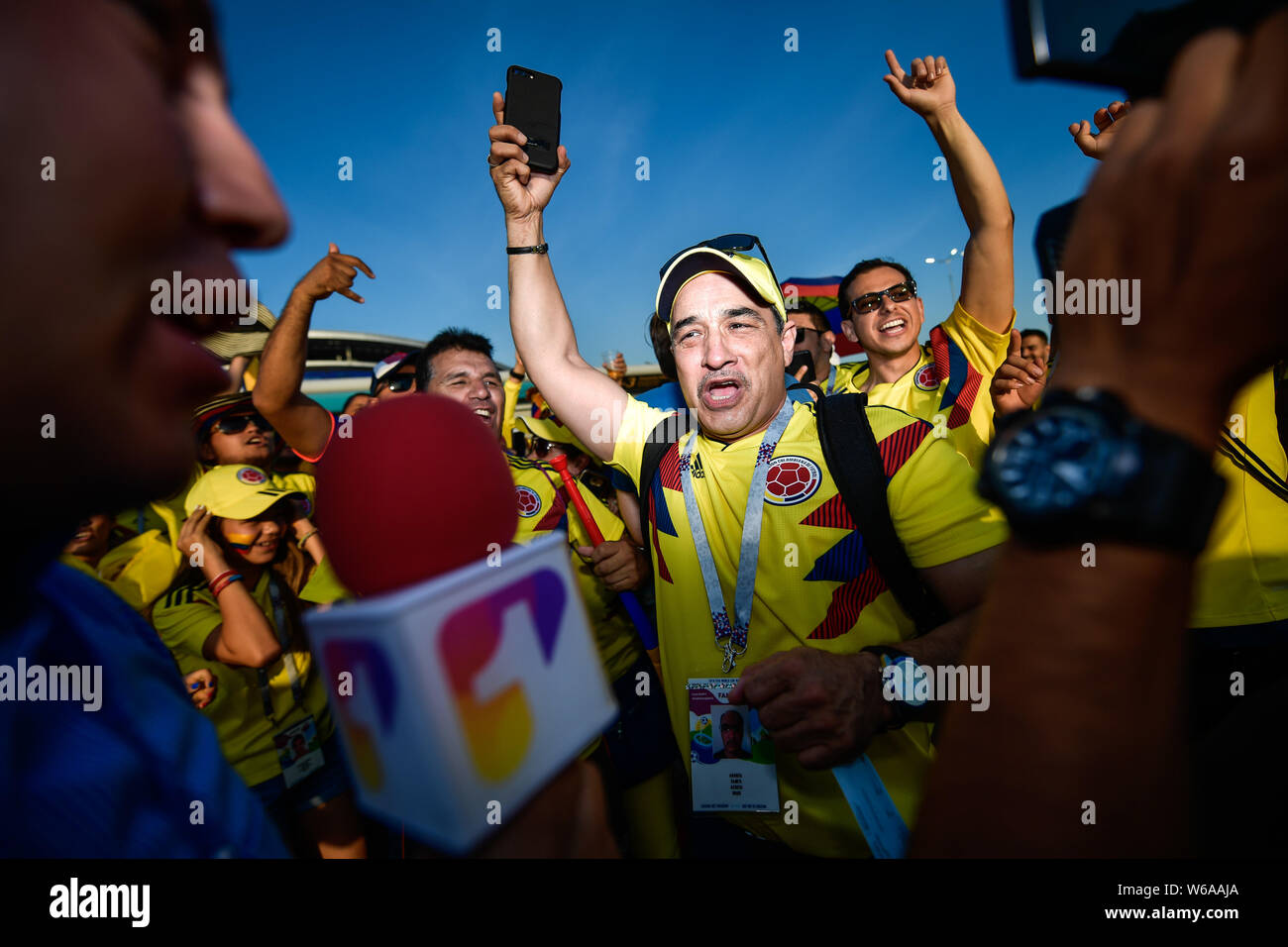 Colombian fans are dressed up as they gather outside the Kazan Arena ...