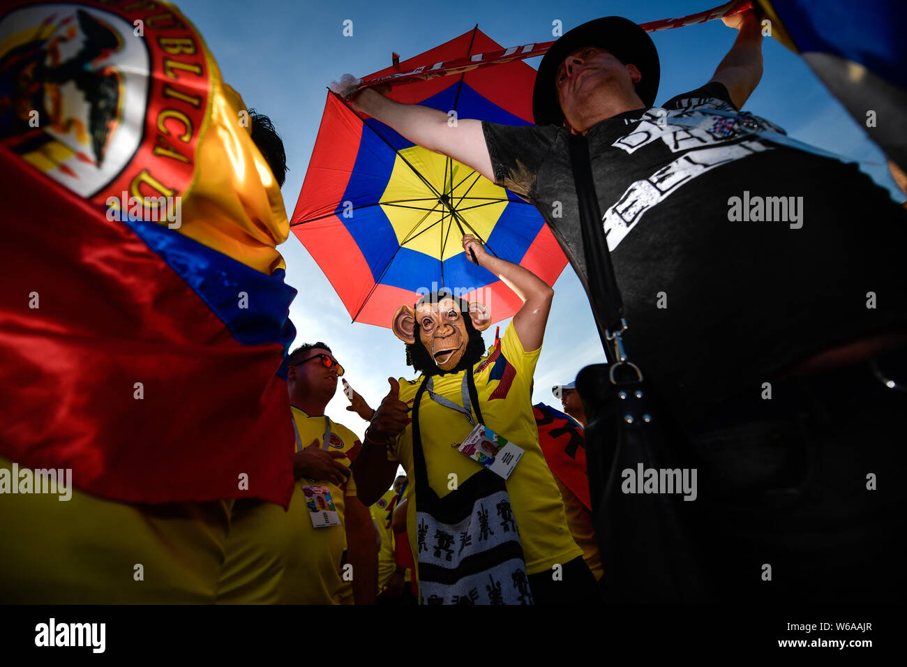 Colombian fans are dressed up as they gather outside the Kazan Arena ...
