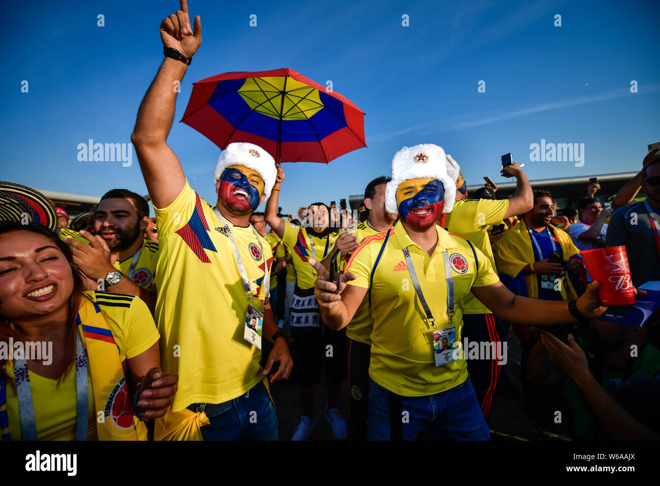 Colombian fans are dressed up as they gather outside the Kazan Arena ...