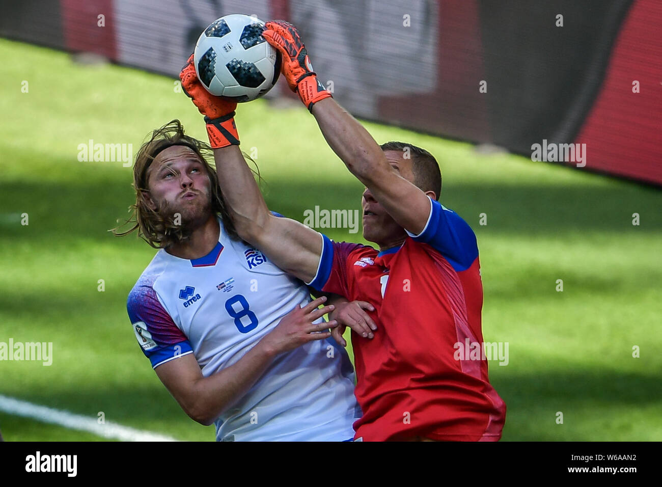 Birkir Bjarnason, left, and goalkeeper Hannes Halldorsson of Iceland ...