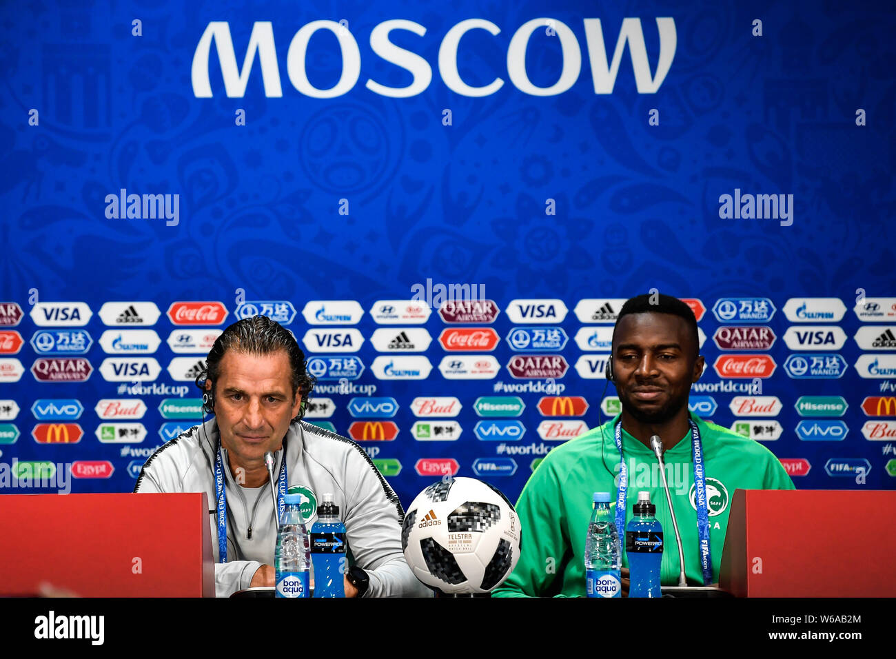 Head coach Juan Antonio Pizzi and player Osama Hawsawi of Saudi Arabia ...
