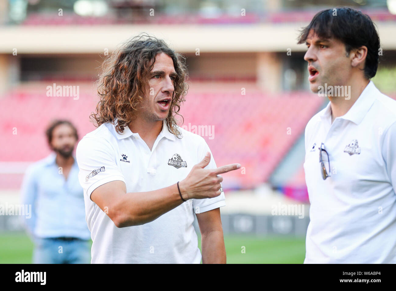 Spanish former football player Carles Puyol and Fernando Morientes take ...