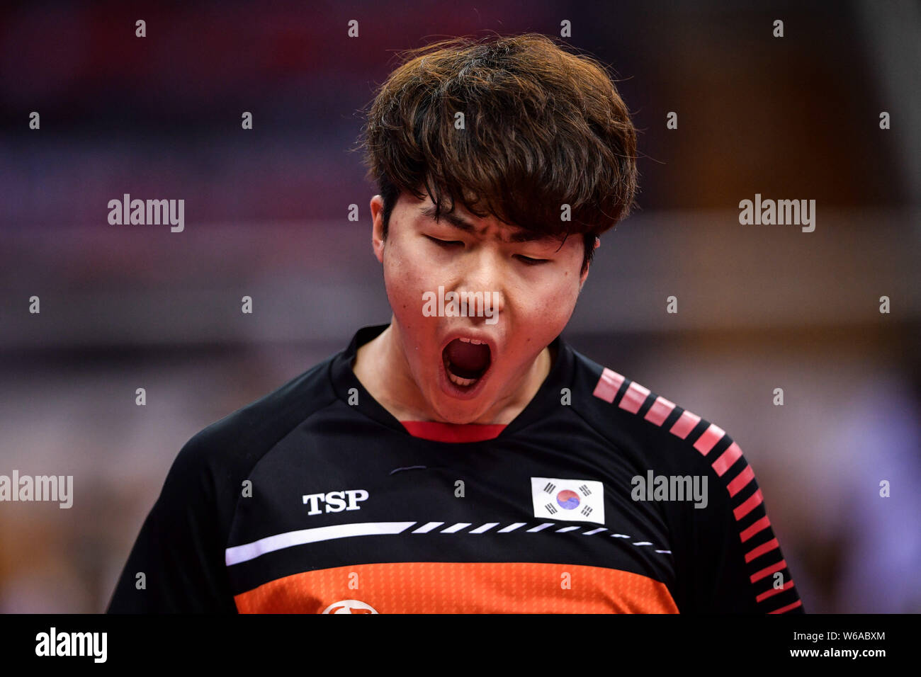 Lim Jong-hoon of South Korea celebrates after scoring against Xu Xin of ...