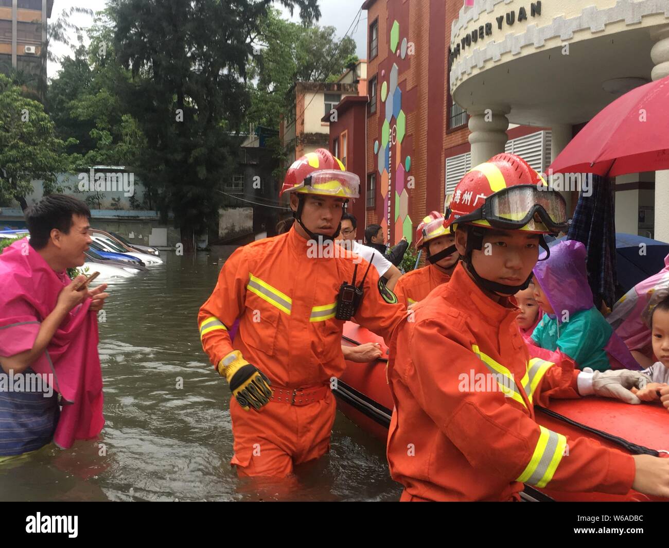 Chinese rescuers evacuate local residents from flooded areas caused by ...