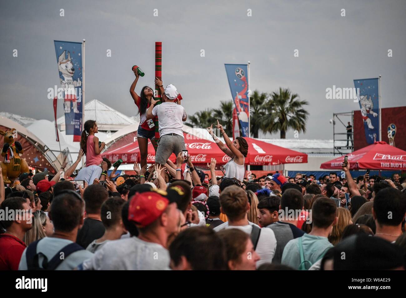 Football fans from the whole world build a human tower in order to ...