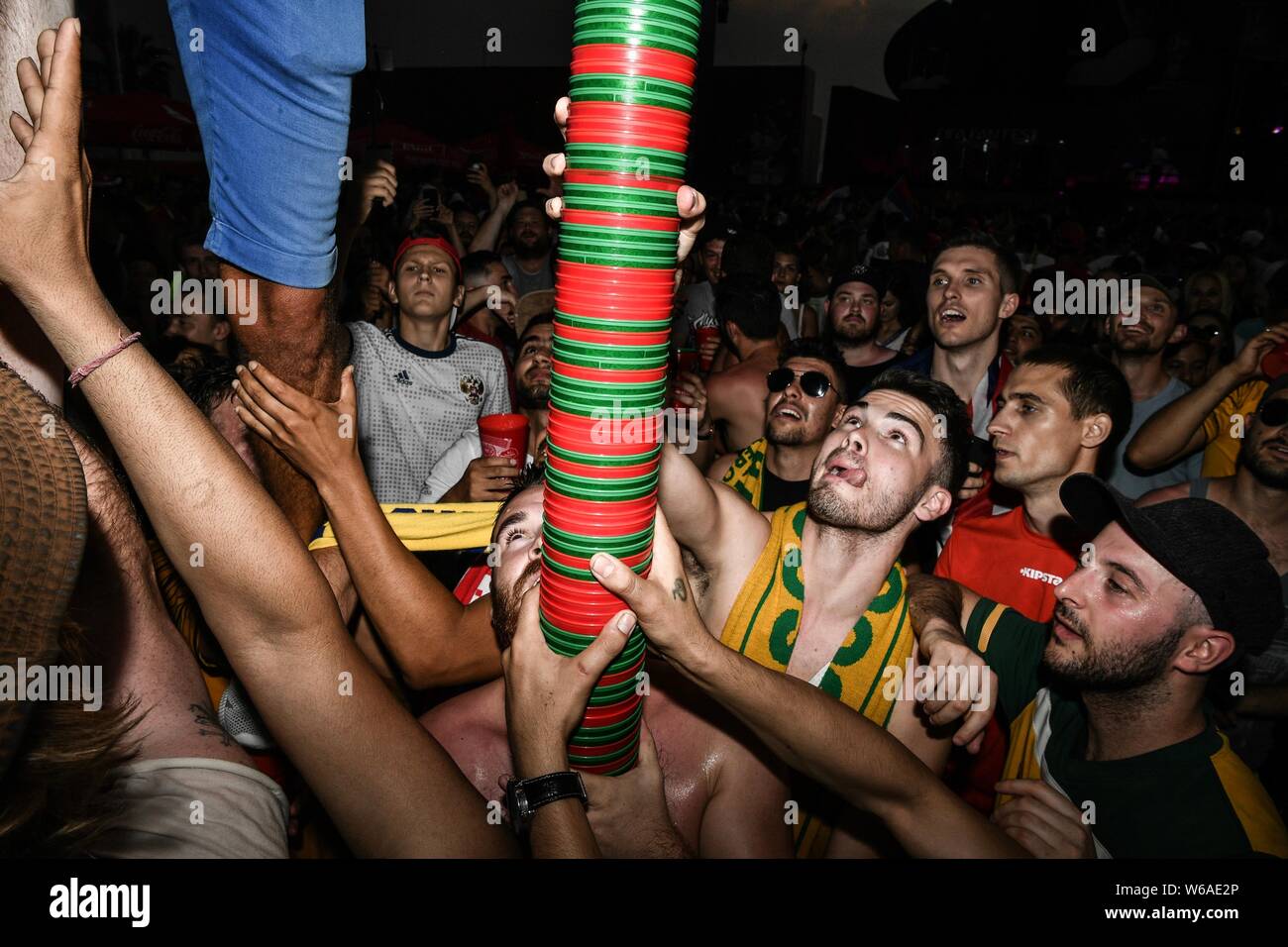 Football fans from the whole world build a human tower in order to ...
