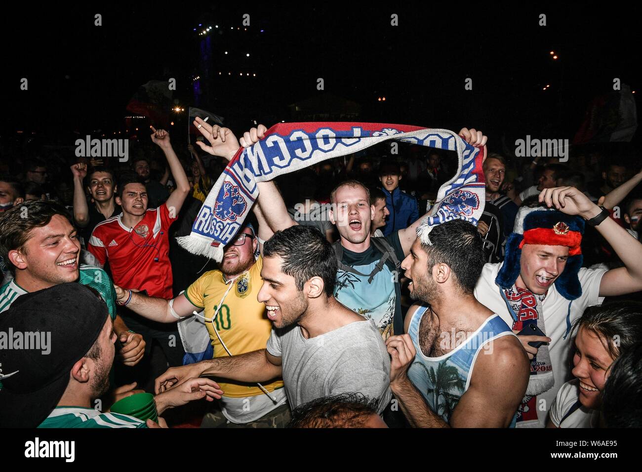 Russian fans celebrate after Russia defeated Egypt in the Group A match ...