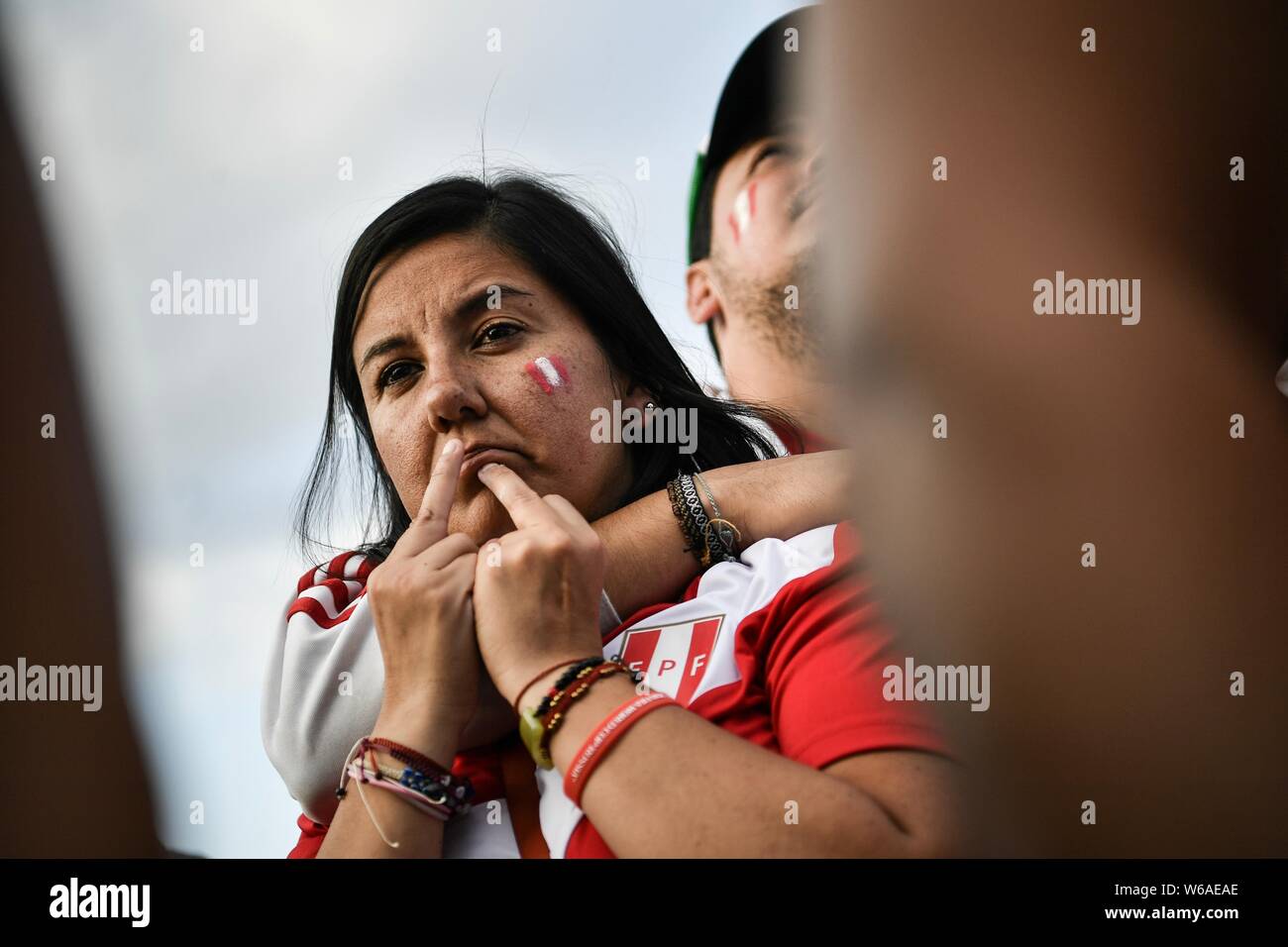 Peruvian fans react as they watch the Group C match between France and ...