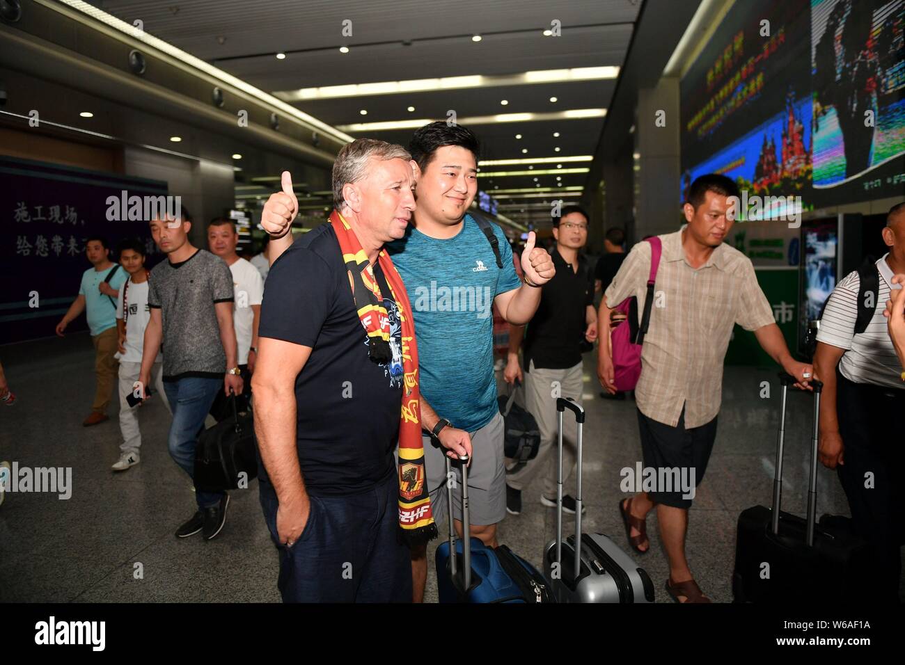 Romanian football manager Dan Petrescu, left, the newly-appointed head ...