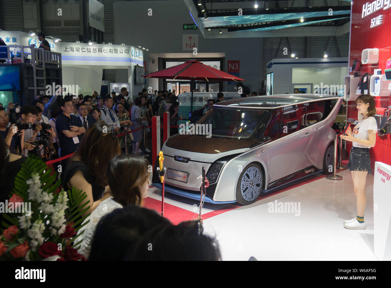 A Hanergy Solar A solar-powered car is on display during the 2018 ...