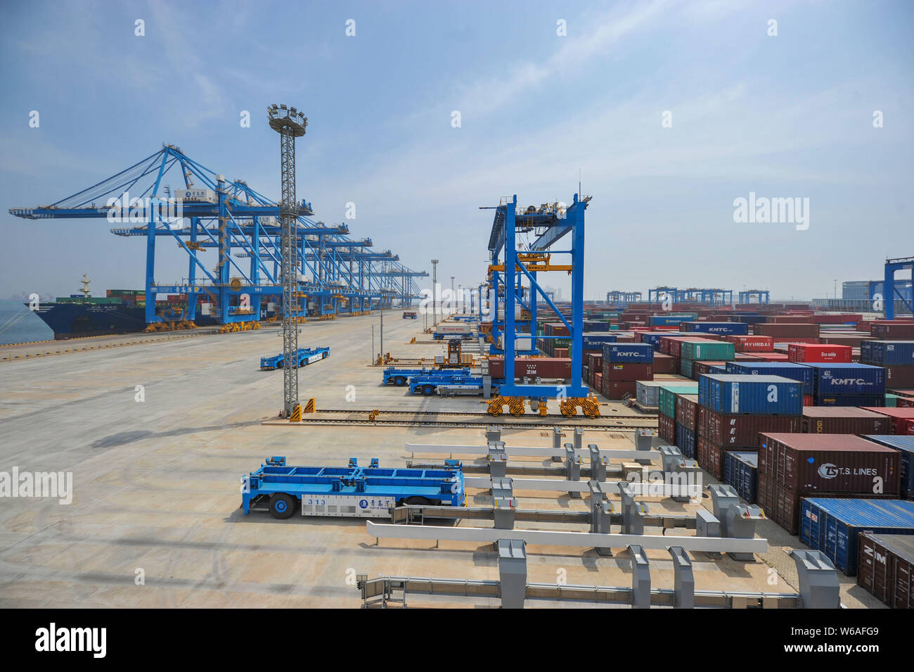 A view of the fully automated container terminal at the Port of Qingdao in Qingdao city, east ...