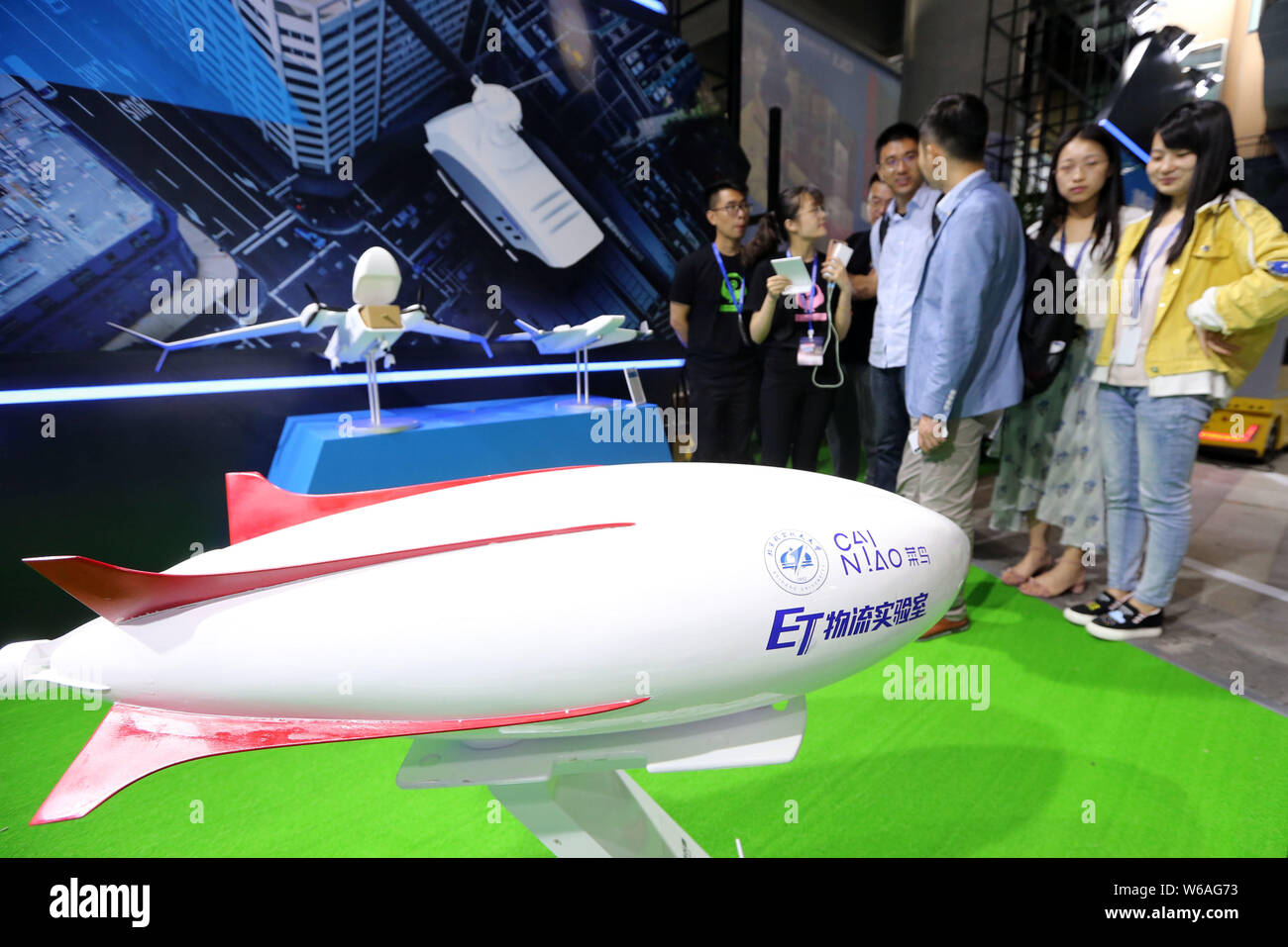 People visit Cainiao ET Logistics Lab at the stand of Cainiao Network ...