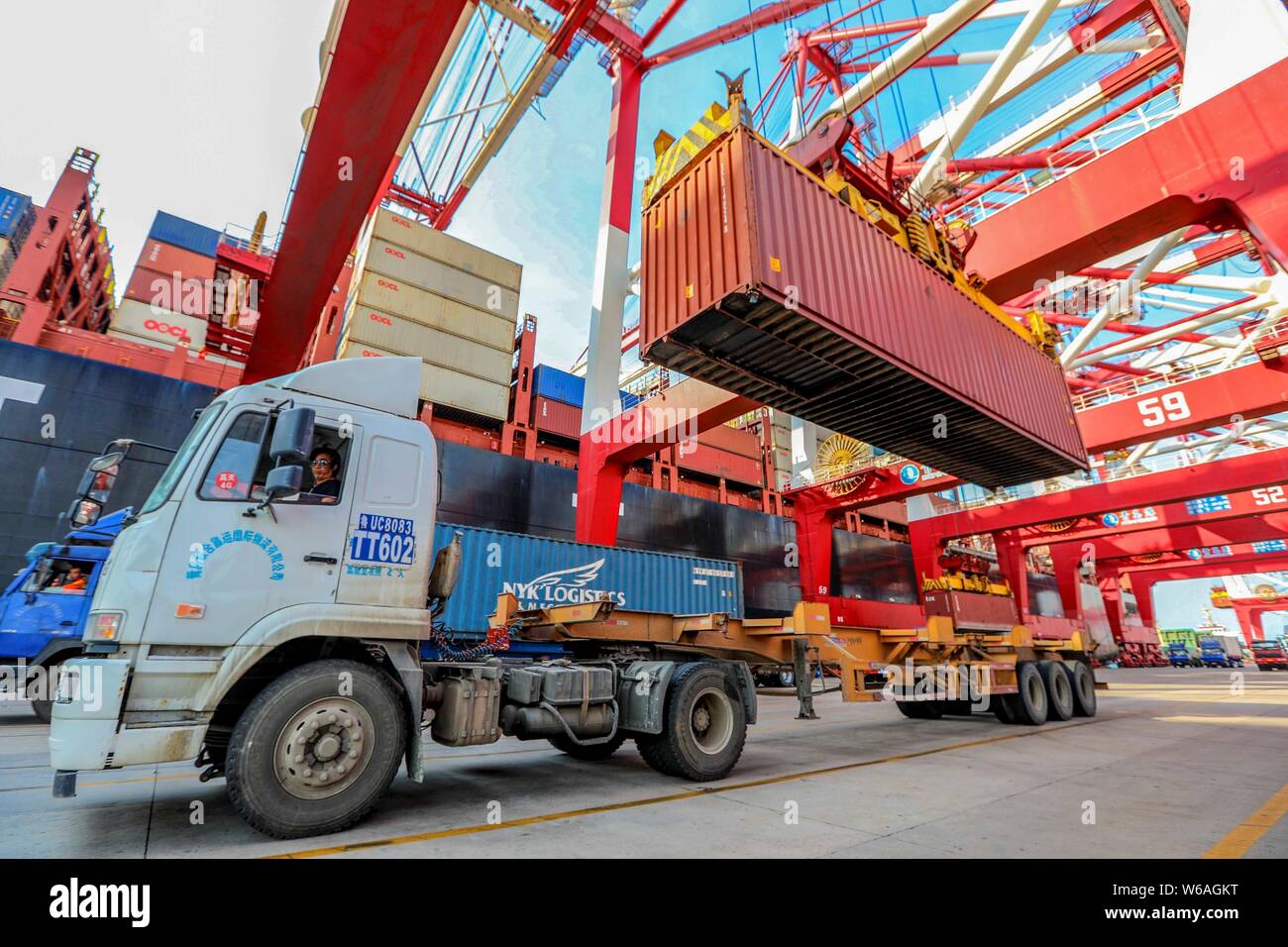 Crane vehicle lifts container hi-res stock photography and images - Alamy