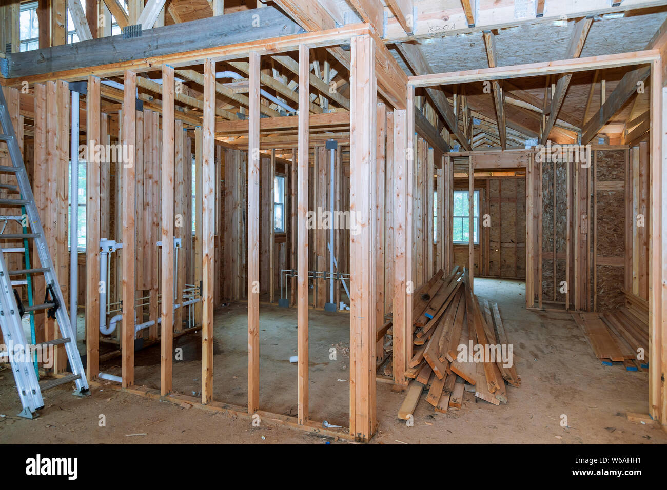 Interior view of a house under construction home framing Stock Photo ...