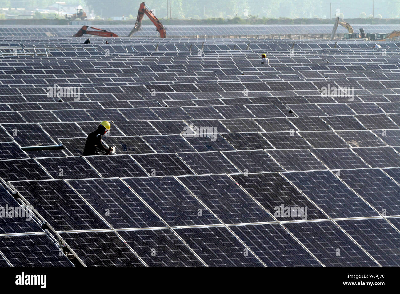 Install solar panel china hi-res stock photography and images - Alamy