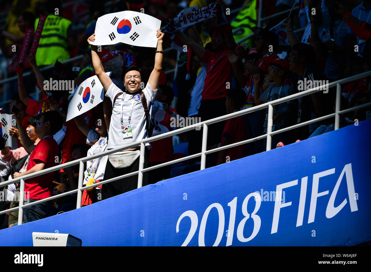 South Korean football fans cheer up to show support for their team ...