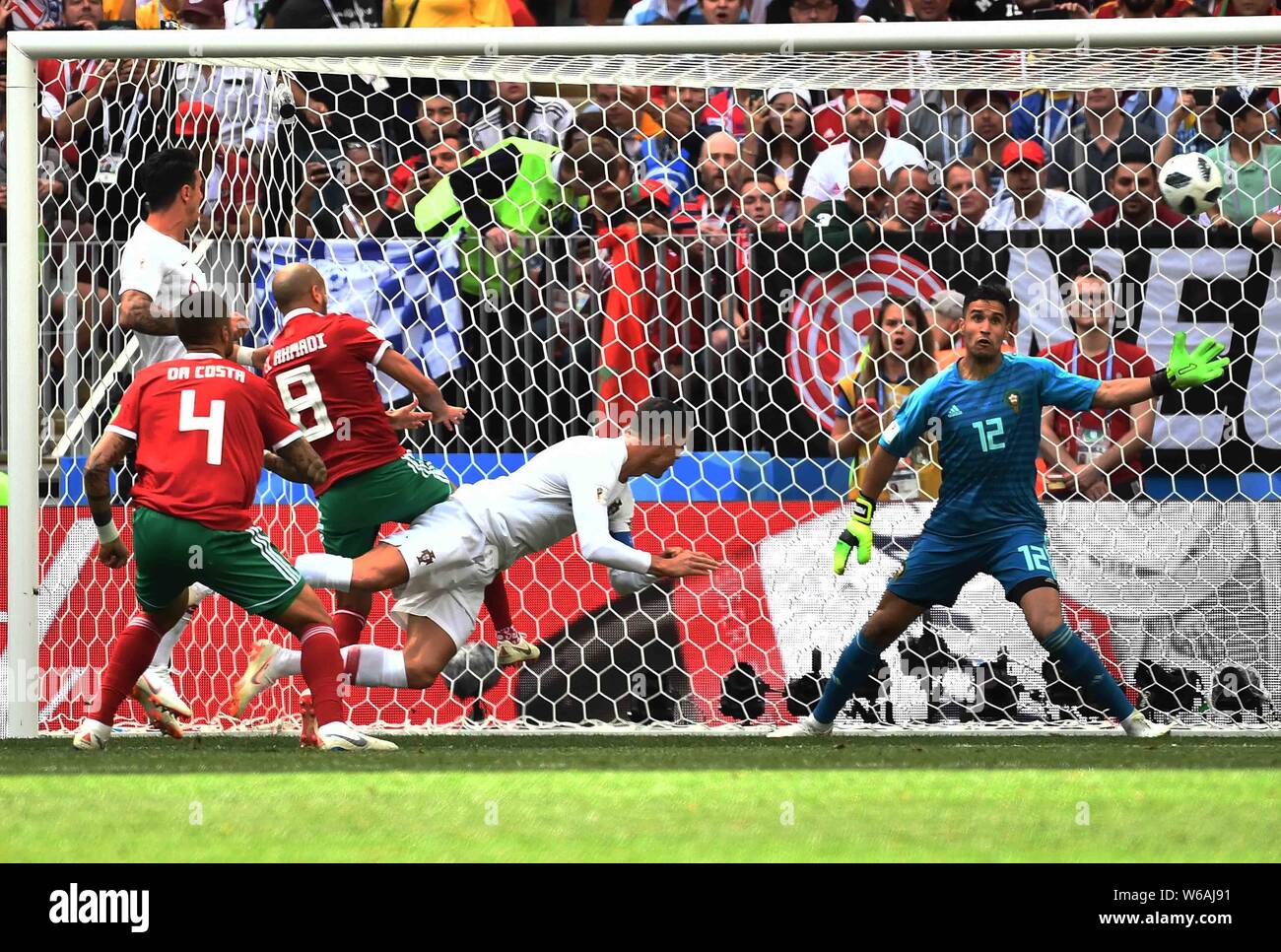 Cristiano Ronaldo of Portugal, center, scores a goal against Morocco in ...