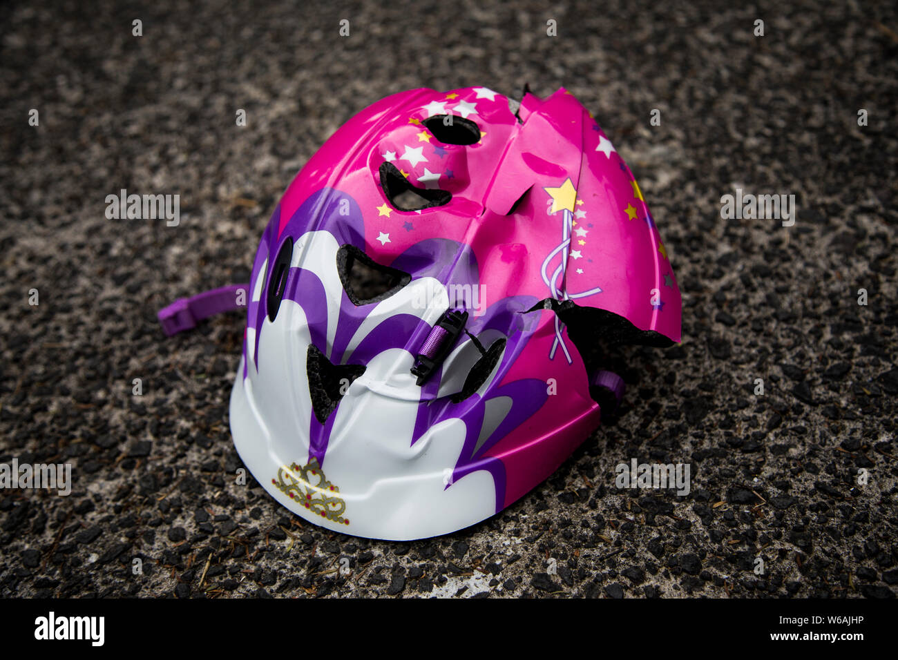 Children's Pink princess helmet with purple straps. Crushed by the ...