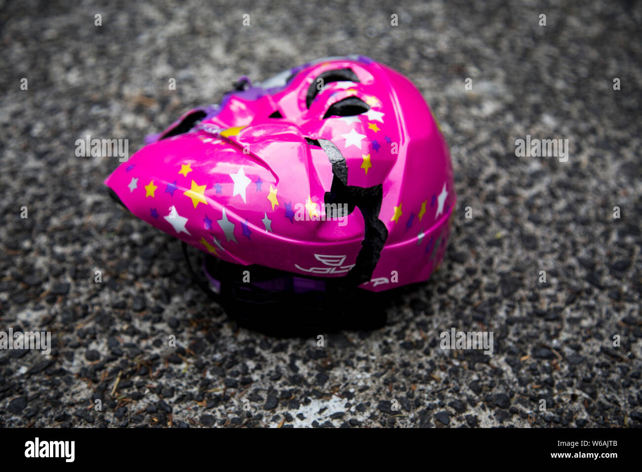 Children's Pink princess helmet with purple straps. Crushed by the ...