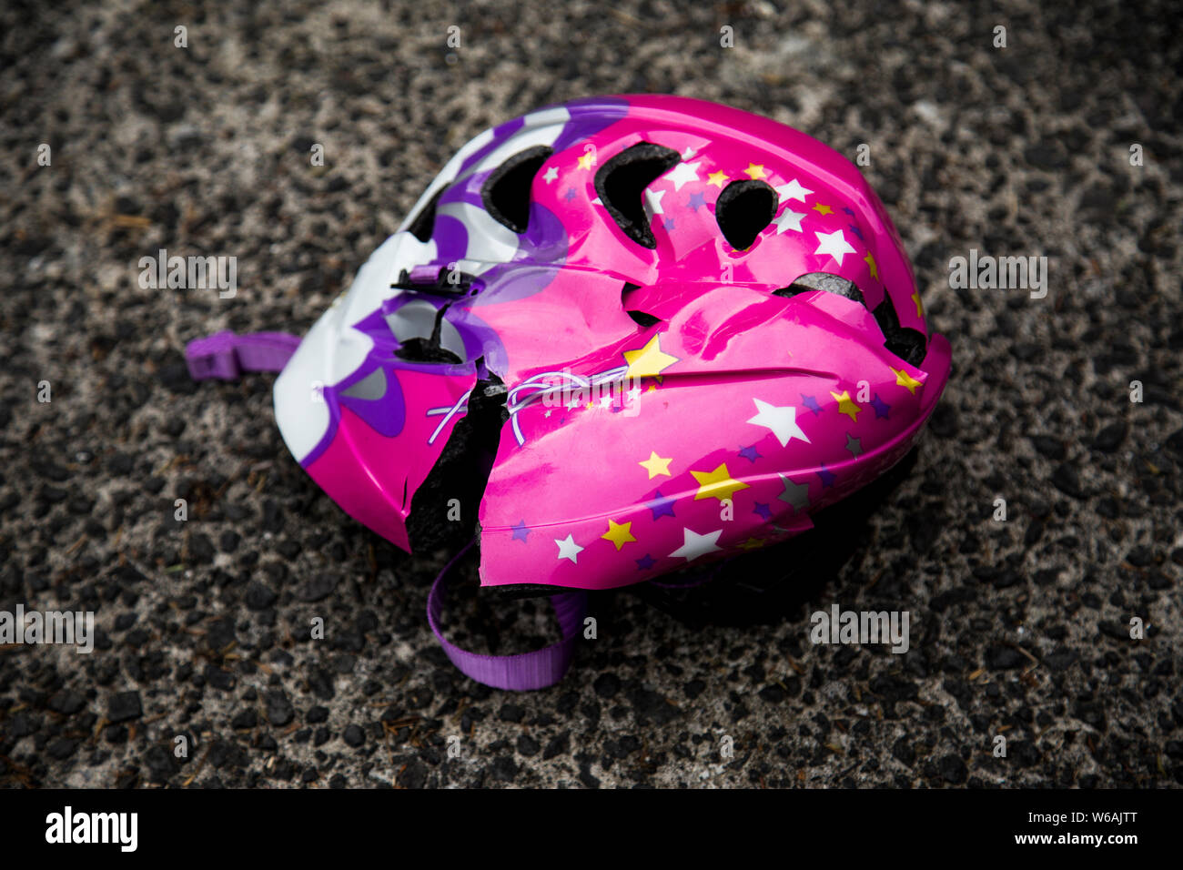 Children's Pink princess helmet with purple straps. Crushed by the ...