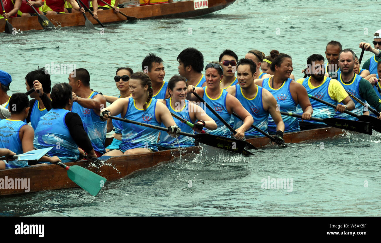 Participants compete in a dragon boat race held to celebrate the Dragon ...