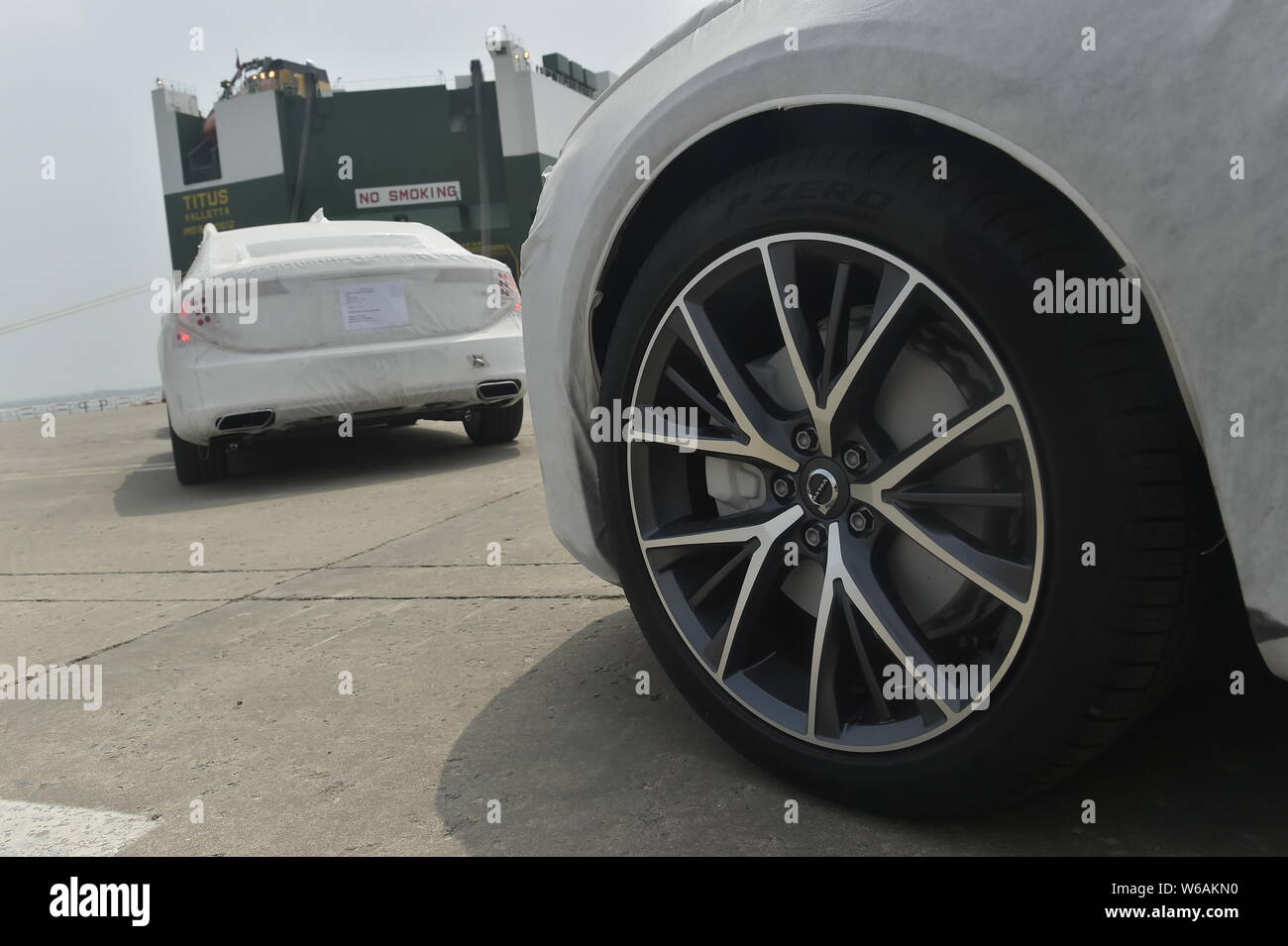 Cars to be shipped are been driven onto the TITUS Pure Car Truck ...