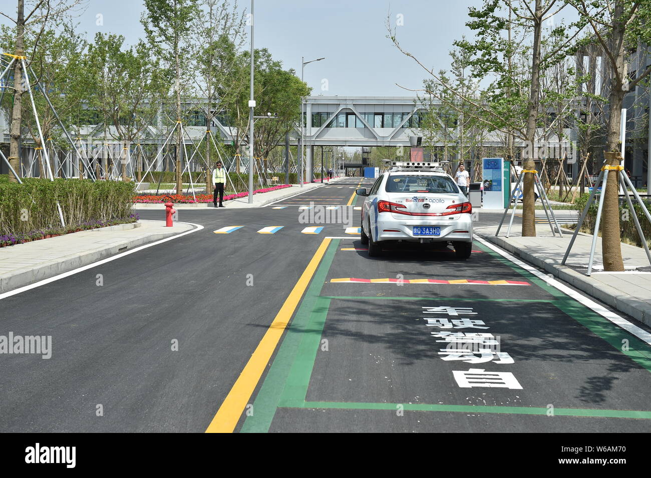 A BYD electric vehicle (EV) with Apollo self-driving technology is ...