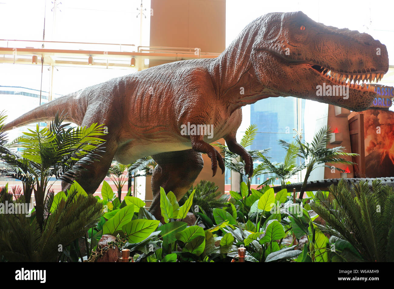 A dinosaur model is on display at the Jurassic World exhibition in Hong ...
